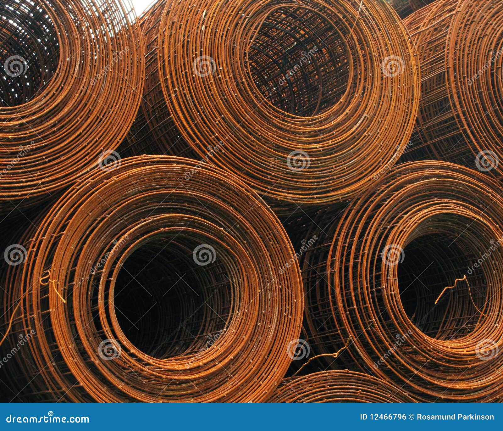 Rusty rolls of wire fence stock photo. Image of fence - 12466796