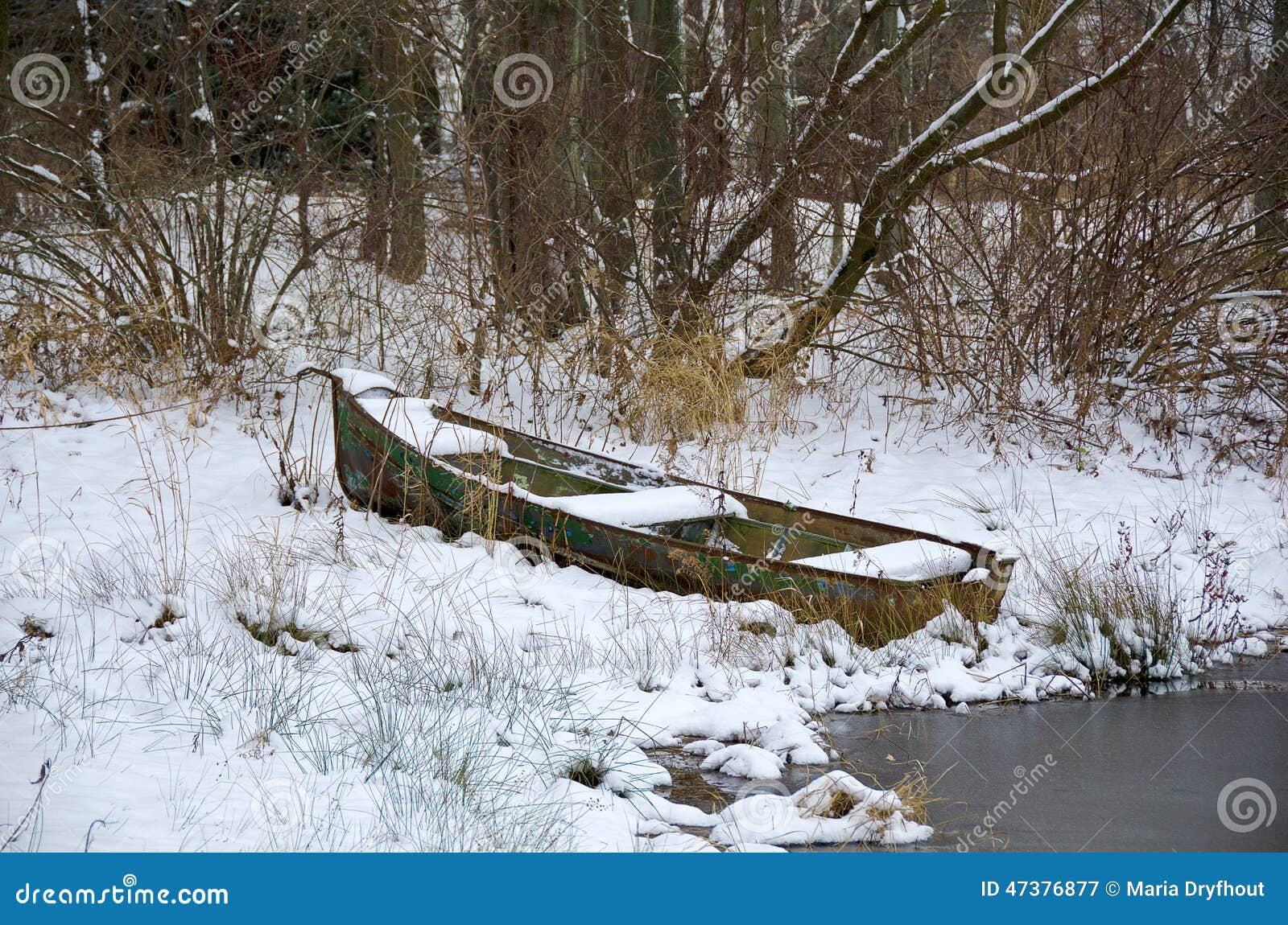 Rusty row boat in snow stock image. Image of snow, country - 47376877