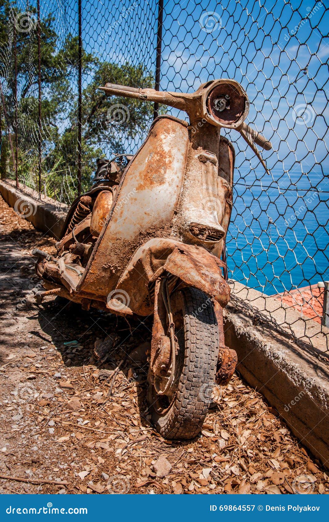 Rusty scooter on the coast stock image. Image of rusty - 69864557