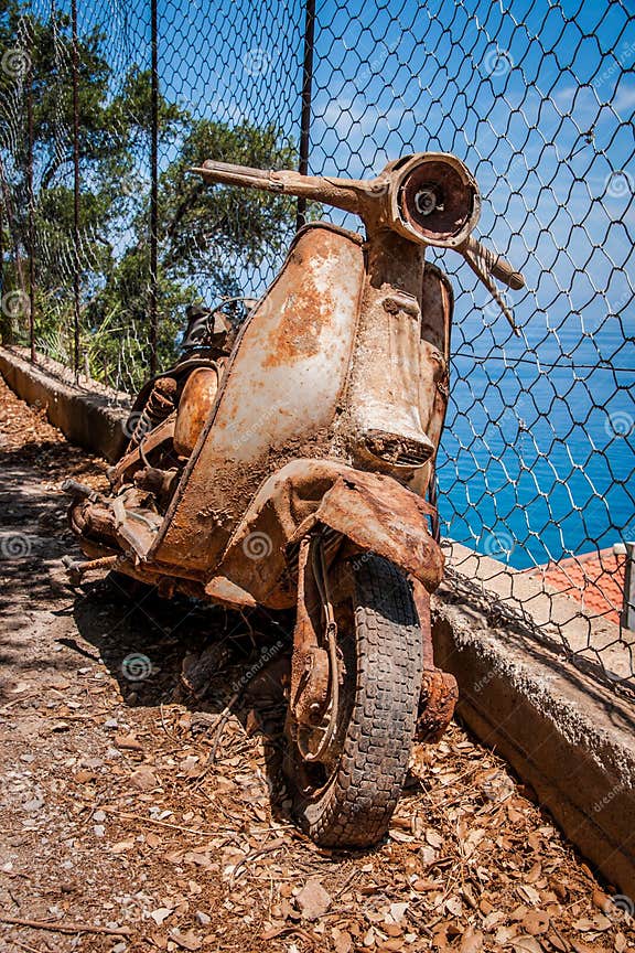Rusty scooter on the coast stock image. Image of rusty - 69864557