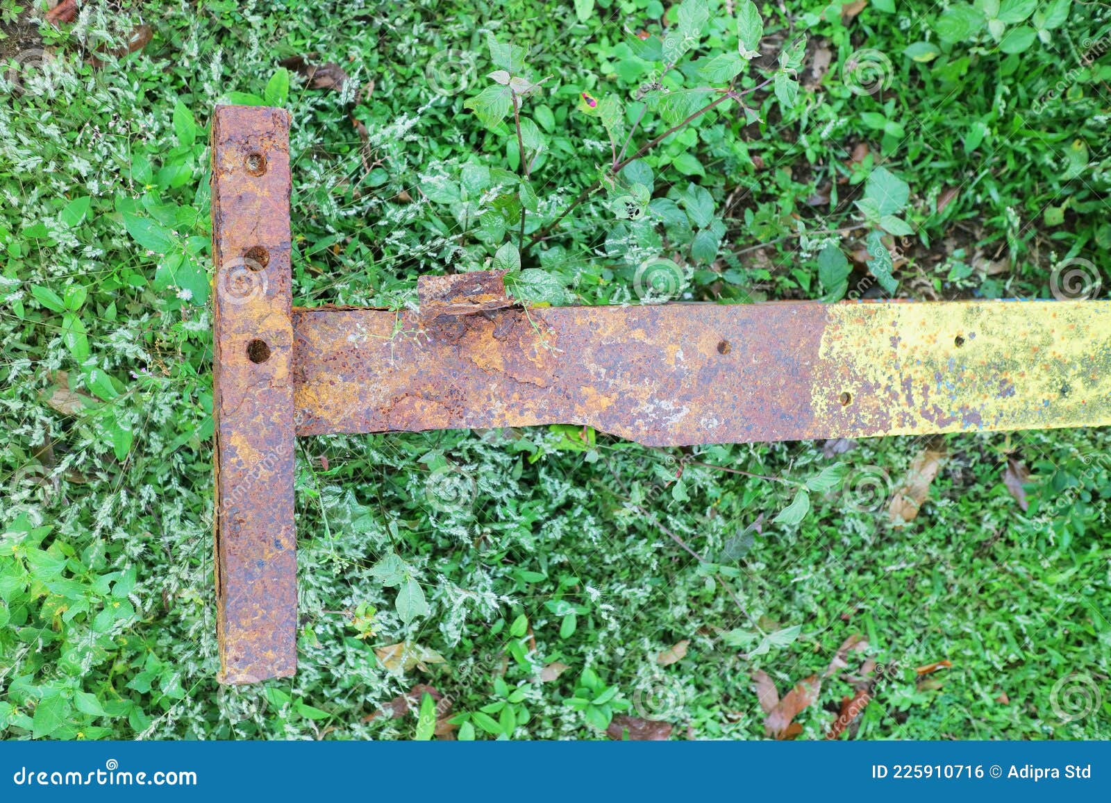 Rusty Scrap Metal on the Grass Stock Photo - Image of machinery ...