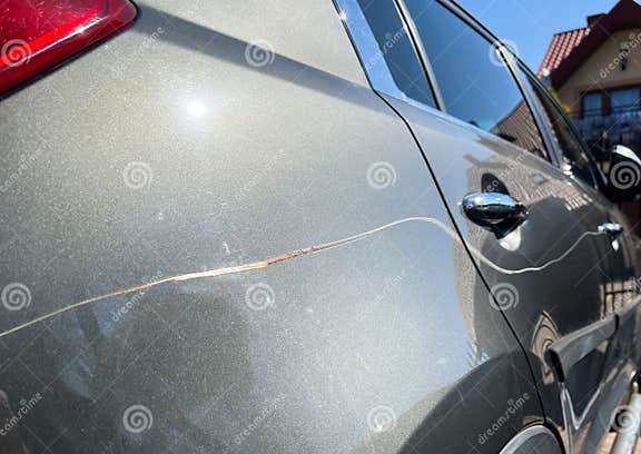 Rusty Scratches Left on a Car Body Lacquer. Deep, Difficult Damages of ...