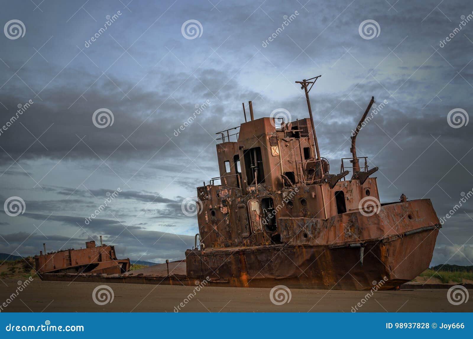 Rusty ship on the shore. stock photo. Image of coastline - 98937828