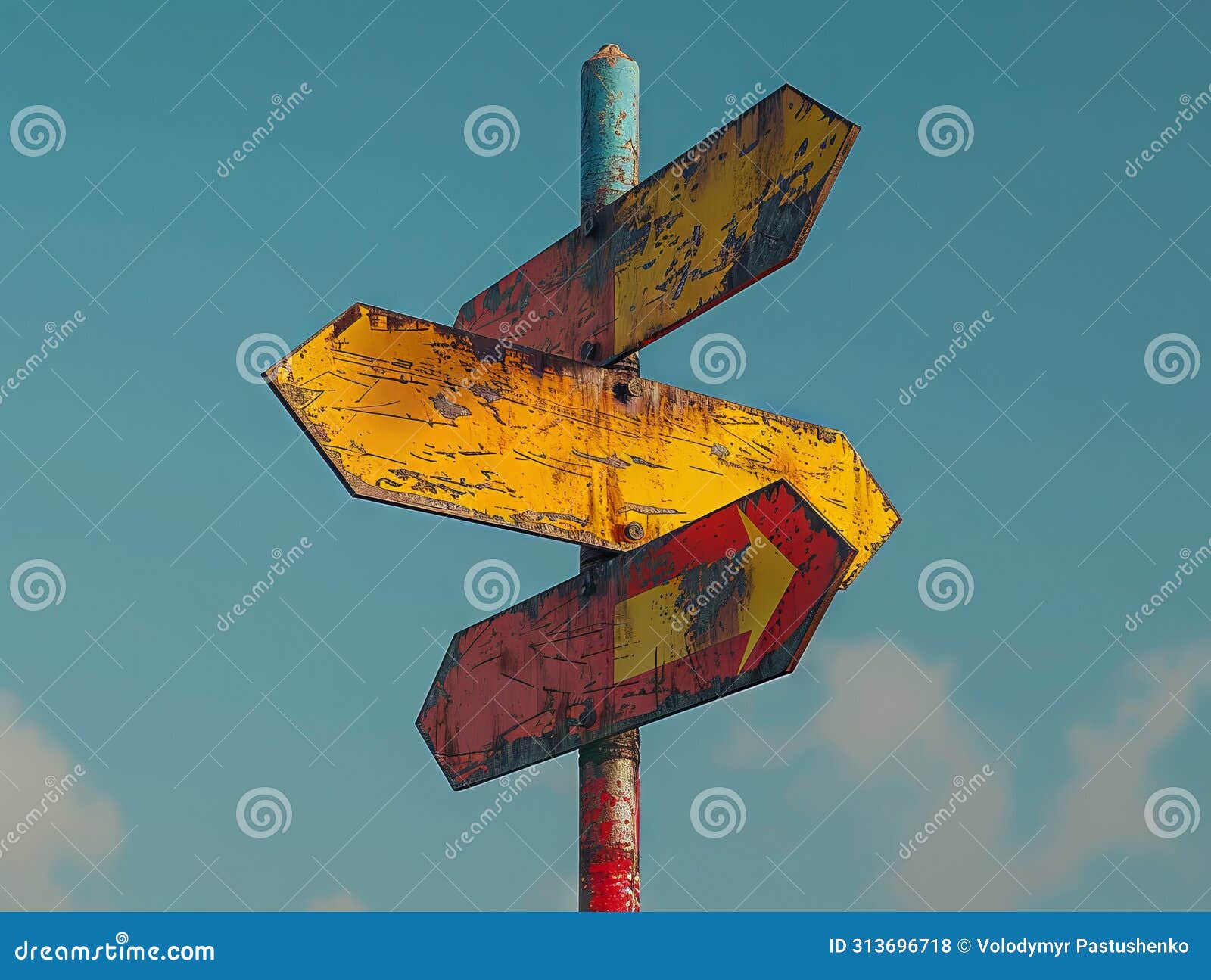 A Rusty Sign with Arrows Pointing in Different Directions Stock Photo ...