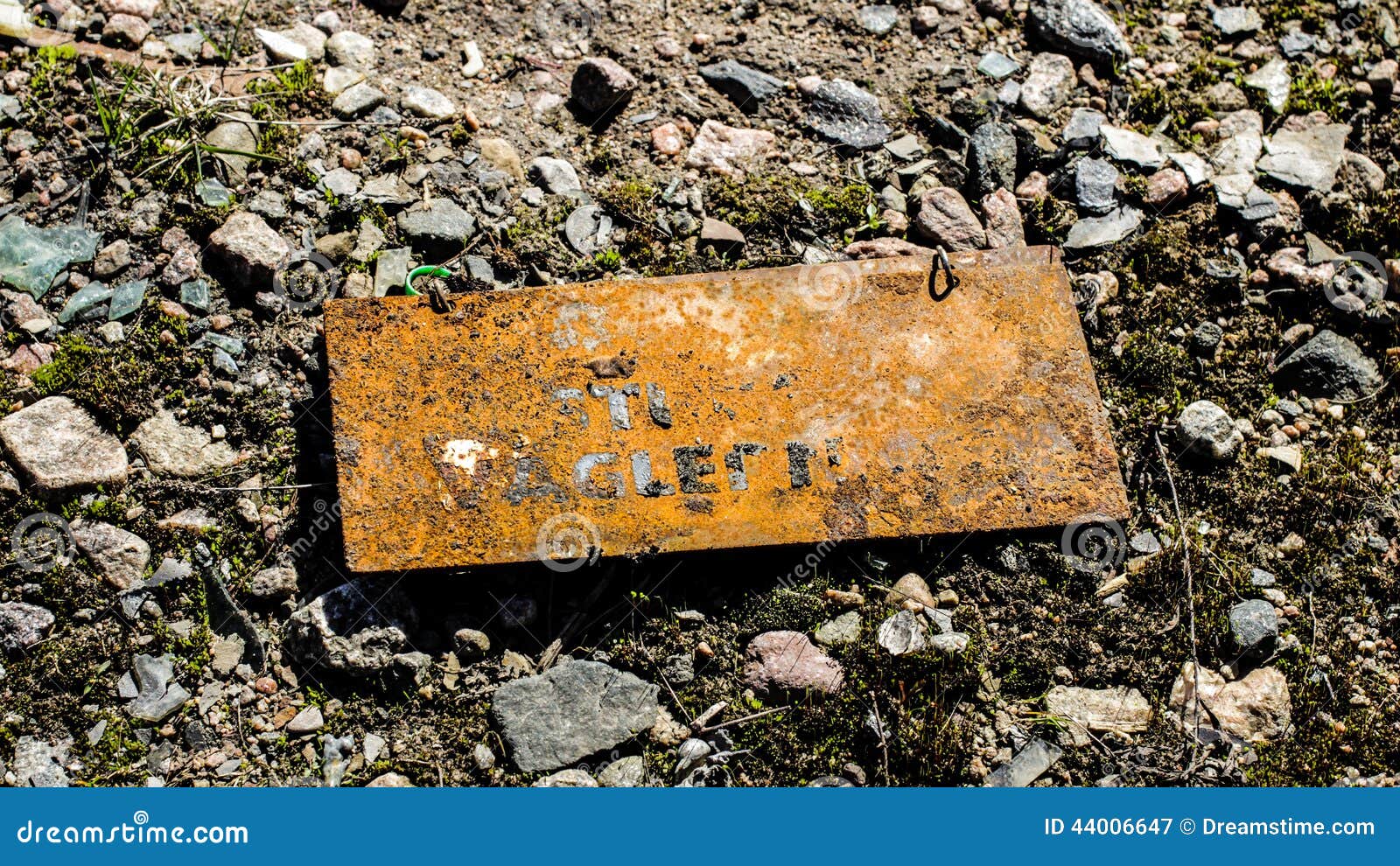 Rusty sign on the ground stock image. Image of gravel - 44006647