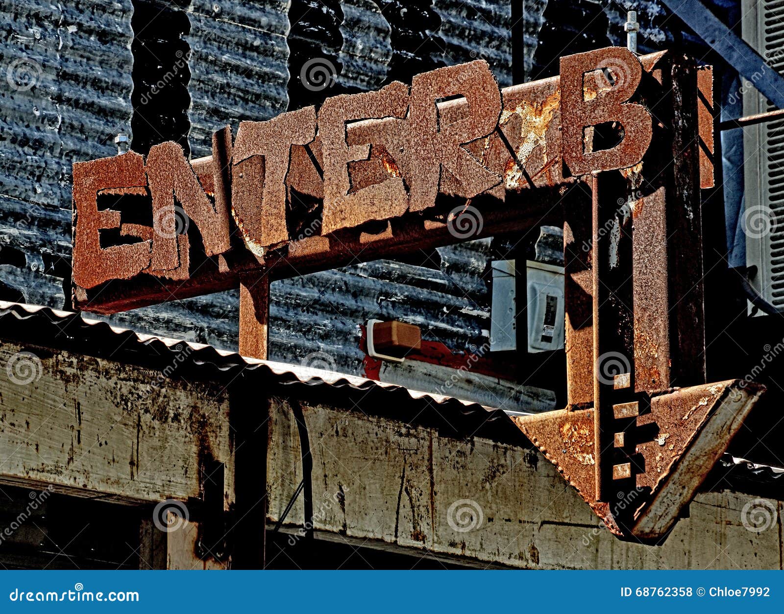 Rusty sign points the way stock photo. Image of dirty - 68762358