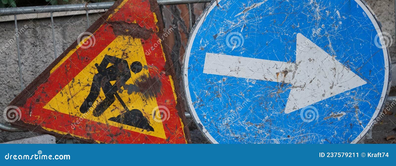 Rusty Sign of Work in Progress at a City Road Construction Site Stock ...