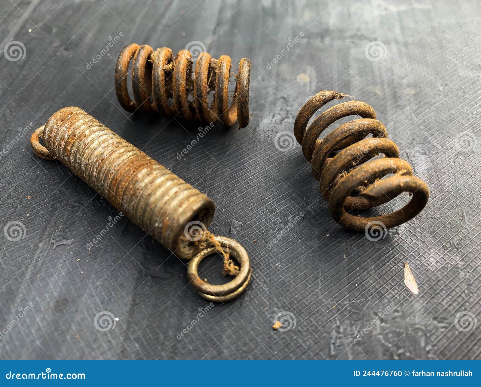 Rusty Spring Iron on a Gray Background in the Barn Stock Photo - Image ...