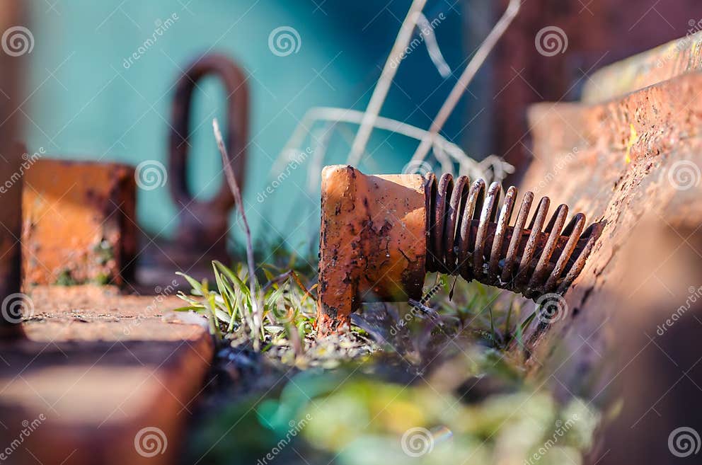 Rusty Spring of Machine with Plants Stock Image - Image of places ...