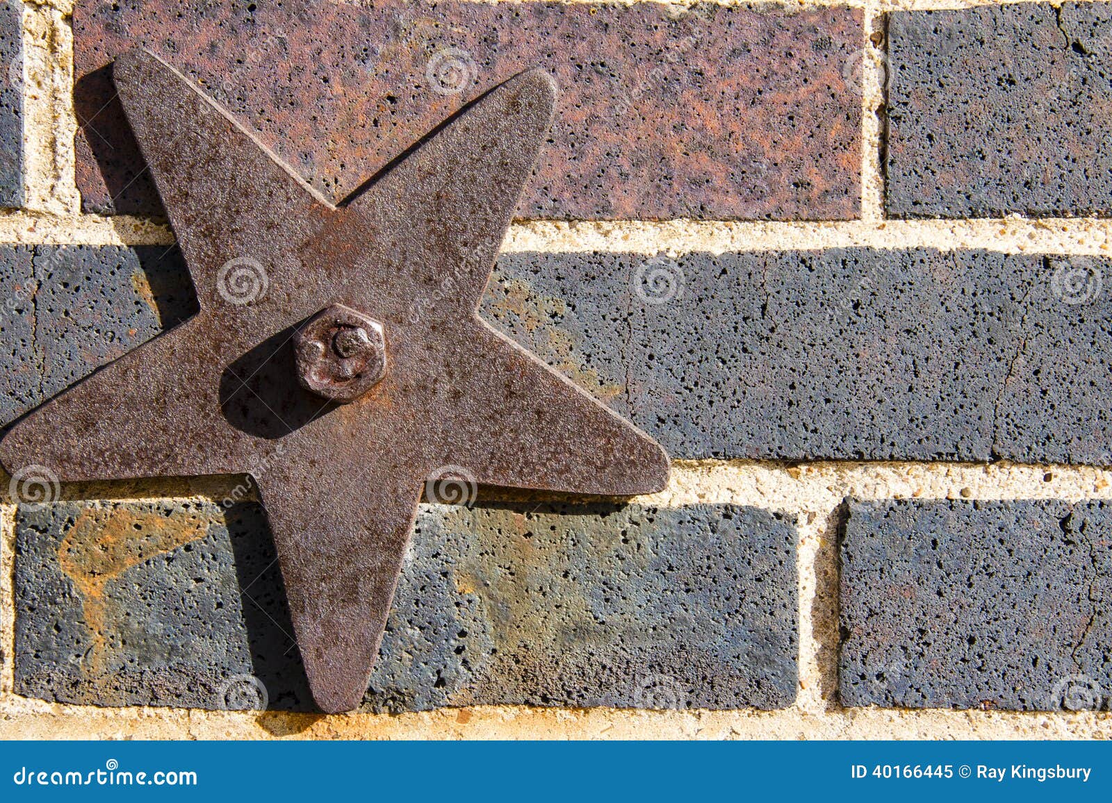 Rusty star on brick wall stock image. Image of textured - 40166445