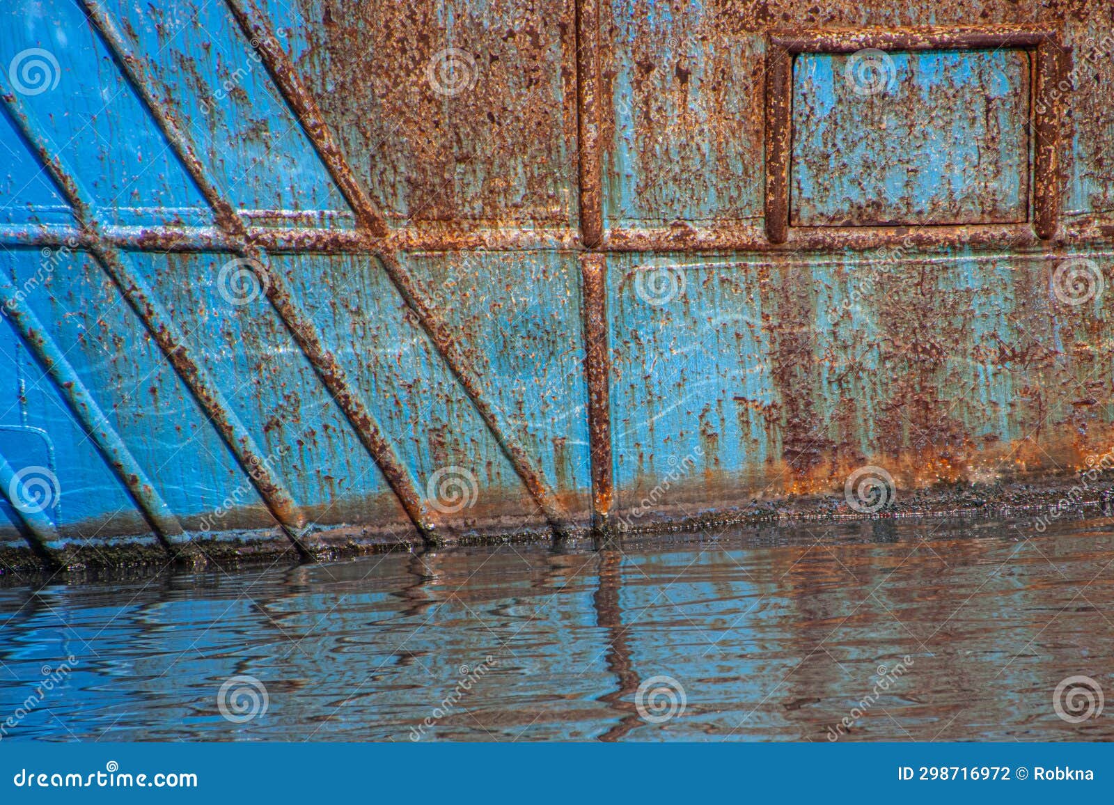 Rusty Structure on a Blue Abandoned Ship Hull in a Harbor Stock Photo ...
