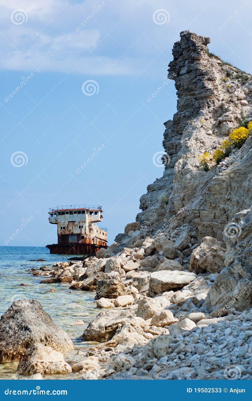 Rusty Sunken Ship among the Sea Rocks Stock Image - Image of boat, iron ...
