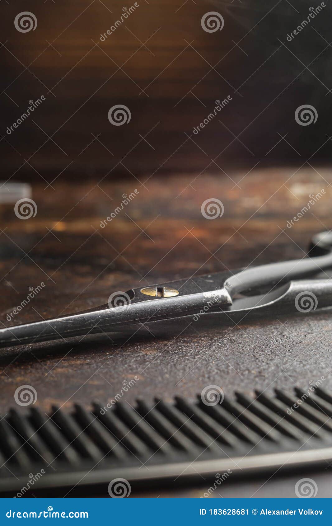 On a Rusty Surface Hairdressing Scissors and Comb. Close Up. Rustic ...