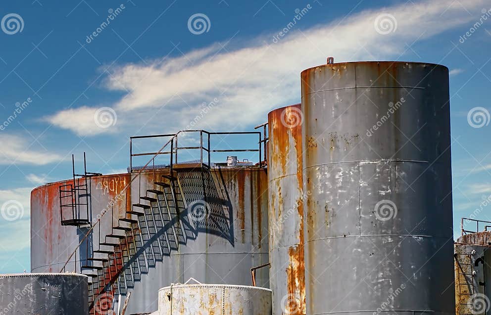 Rusty Tanks and Stairs stock image. Image of storage - 169394401