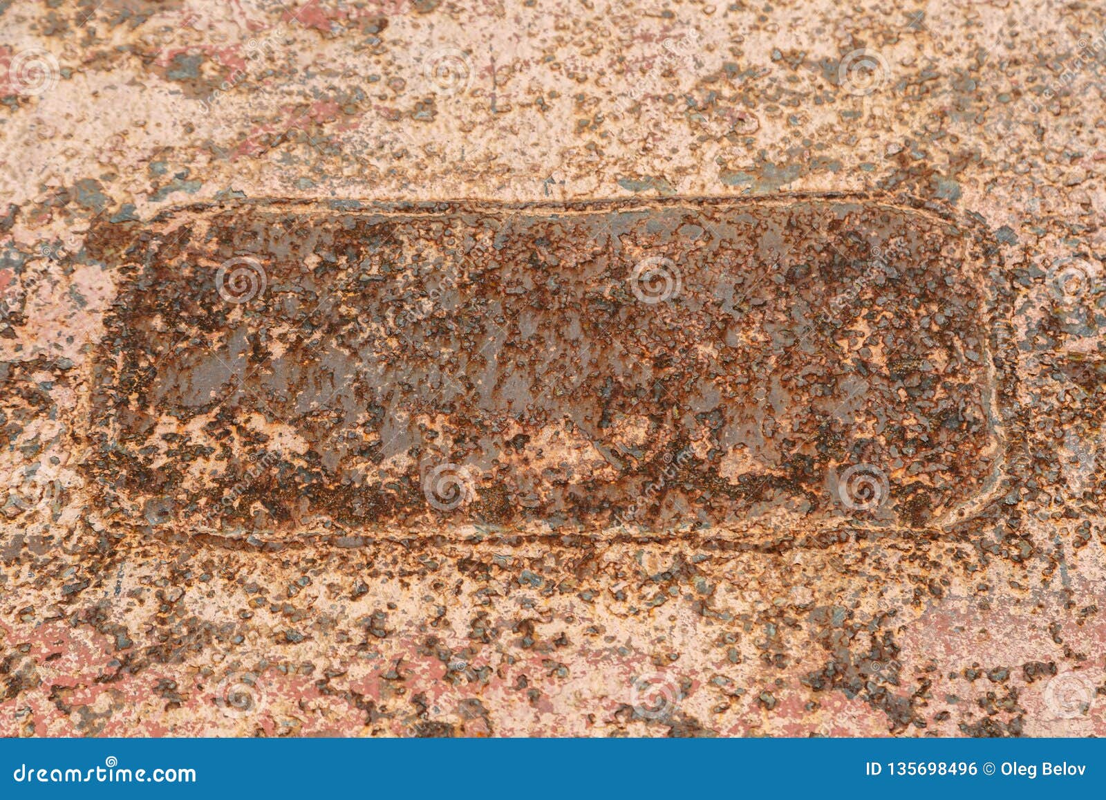 Rusty Thick Metal Surface with Paint Residue and a Rectangular Welded ...