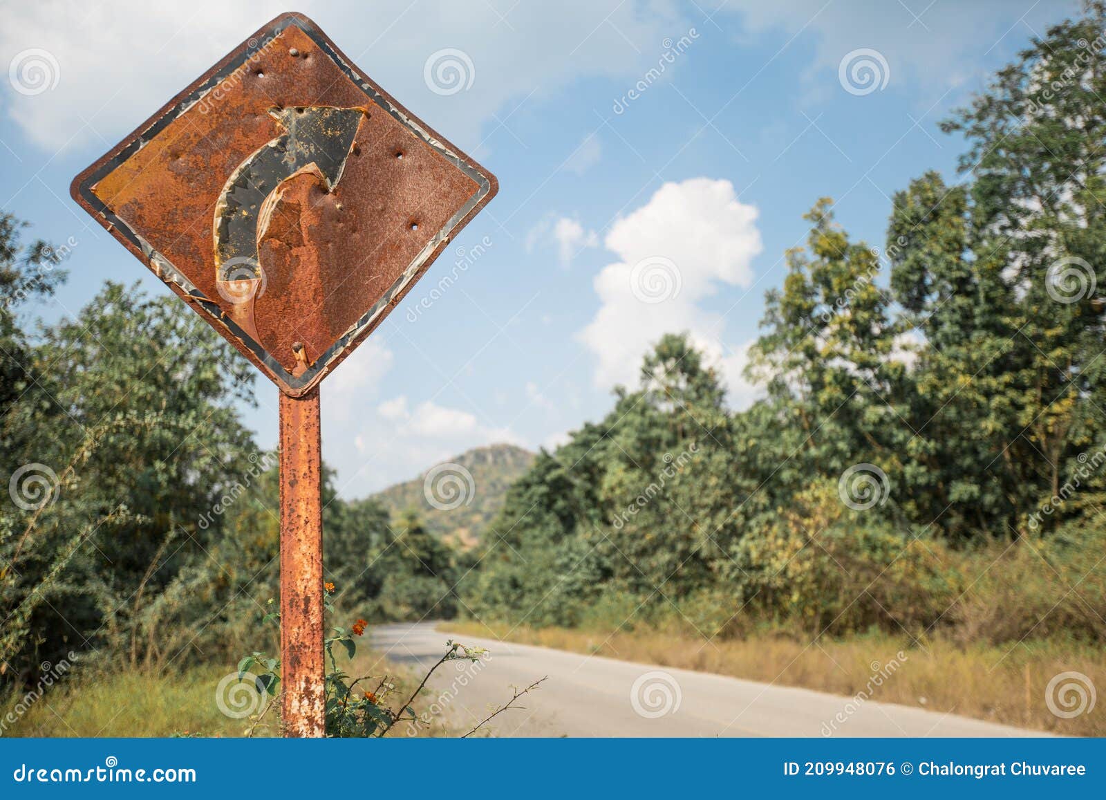 Rusty Traffic Sign on Country Road on Blue Sky Background Stock Photo ...
