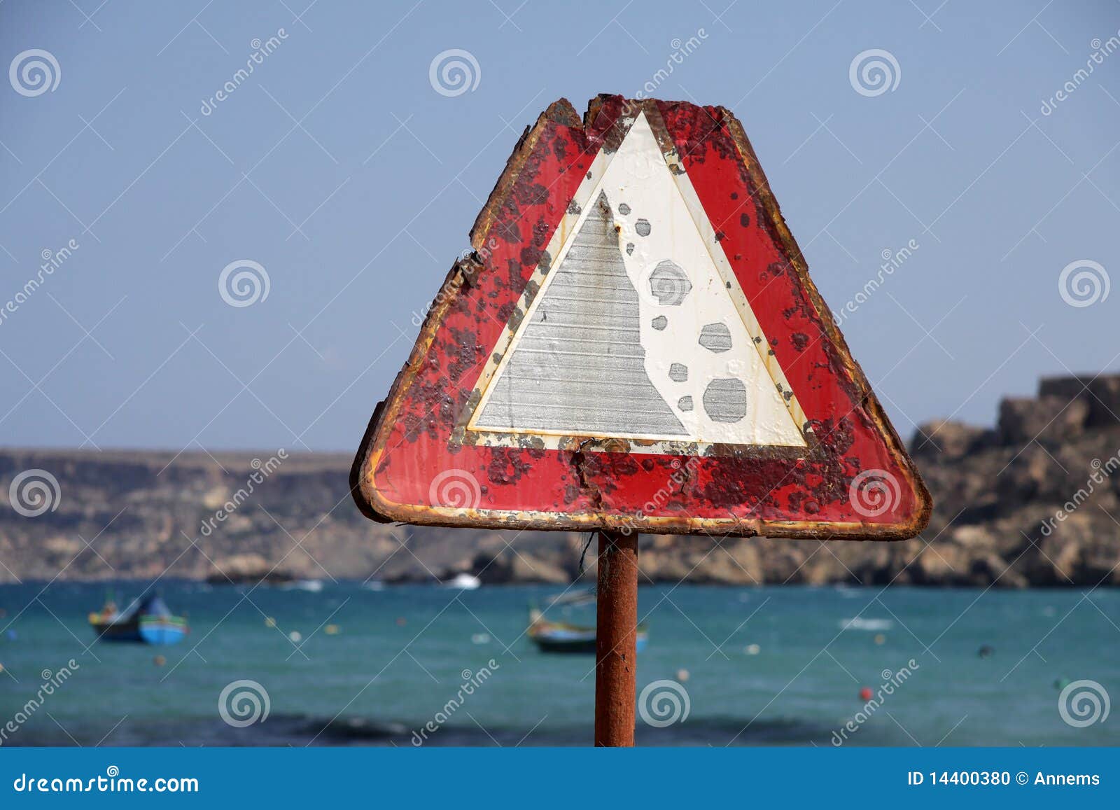 Rusty traffic warning sign stock photo. Image of rocks - 14400380