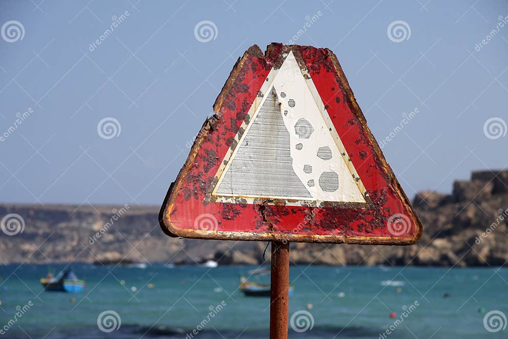 Rusty traffic warning sign stock photo. Image of rocks - 14400380
