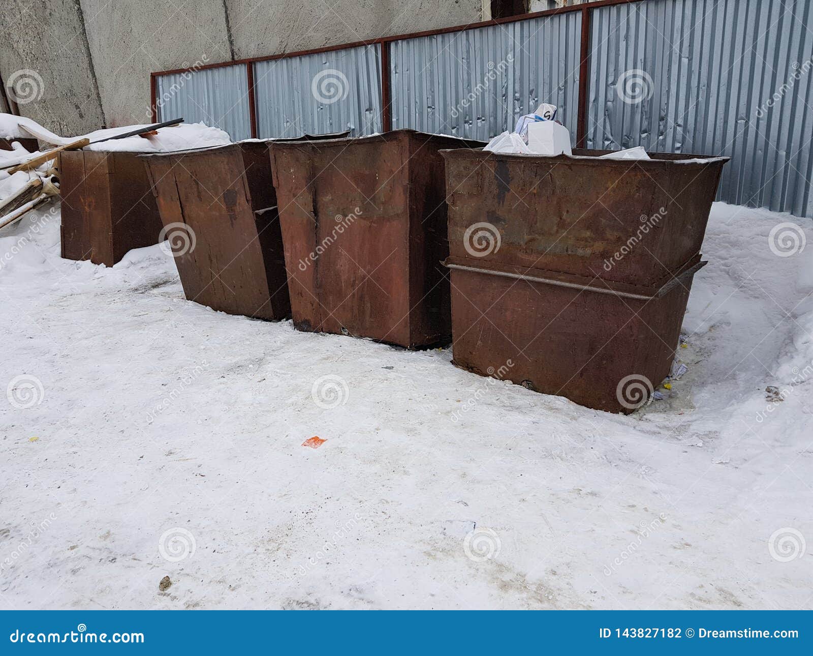 Rusty Trash Cans on the Snow in Winter Stock Photo - Image of ...