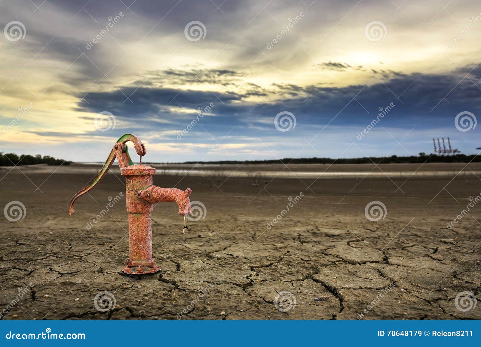 Rusty water pump on land. stock image. Image of drought - 70648179