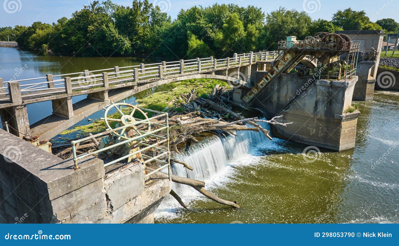 Rusty Wheel and Cogs on Maumee River Dam Equipment beside Waterfall ...