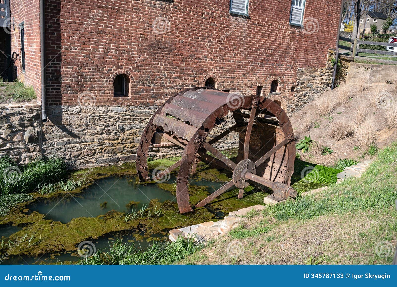 The Rusty Wheel of an Old Water Mill Stock Image - Image of watermill ...