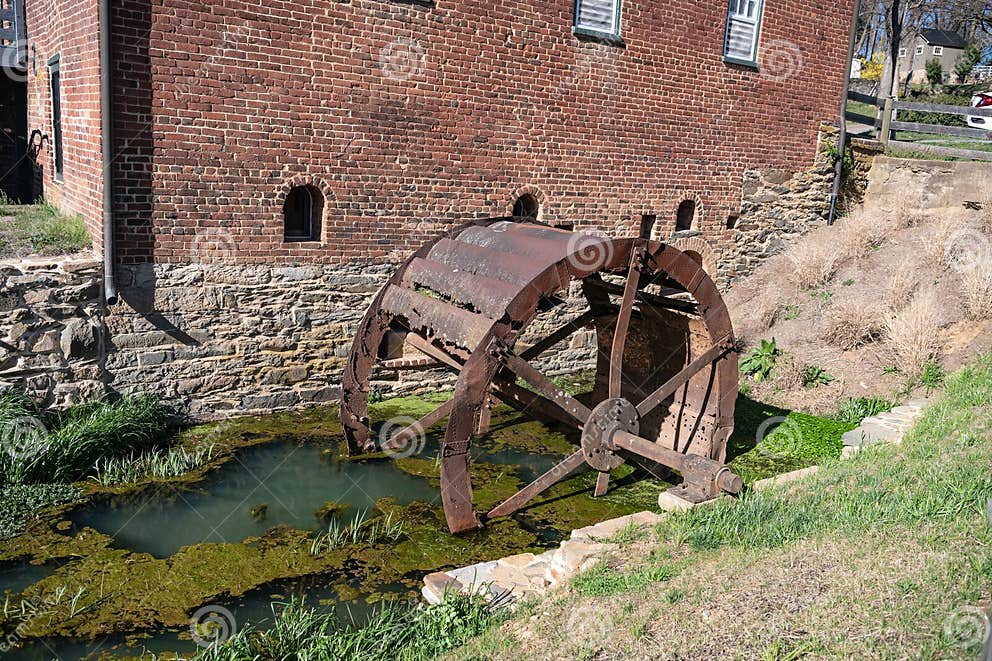 The Rusty Wheel of an Old Water Mill Stock Image - Image of watermill ...