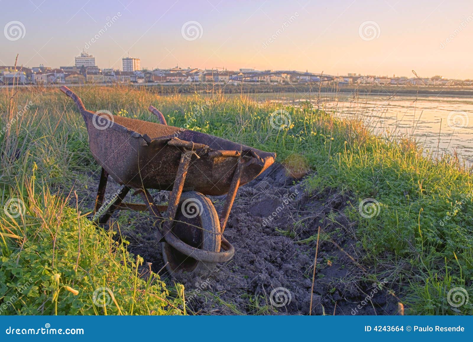 A rusty wheelbarrow stock photo. Image of materials, wood - 4243664