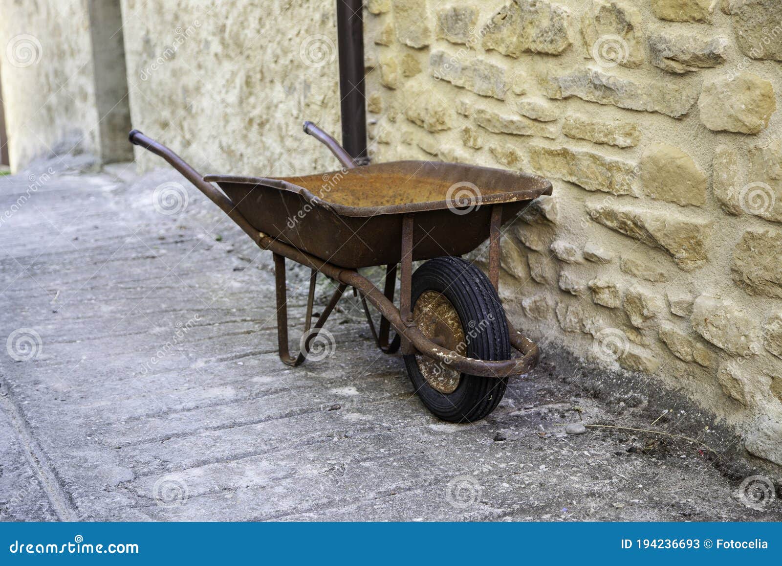 Rusty Wheelbarrow Construction Stock Image - Image of transport, rural ...