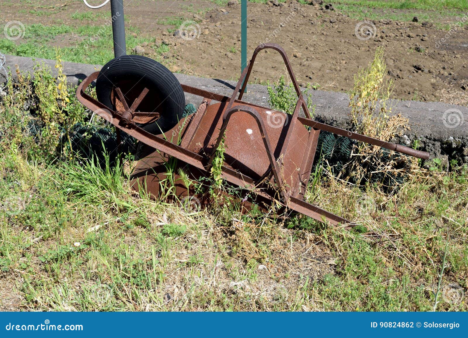 Rusty wheelbarrow stock photo. Image of rust, soil, site - 90824862