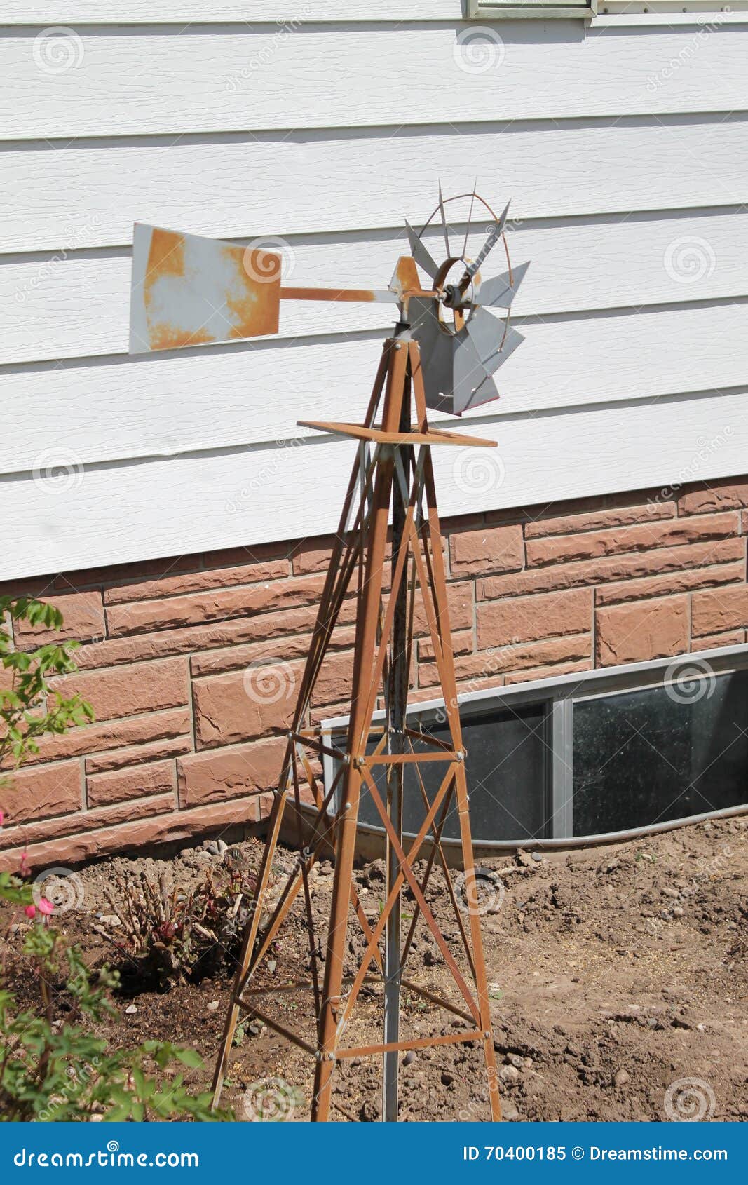 Rusty Windmill Out in the Yard Stock Image - Image of weathered ...