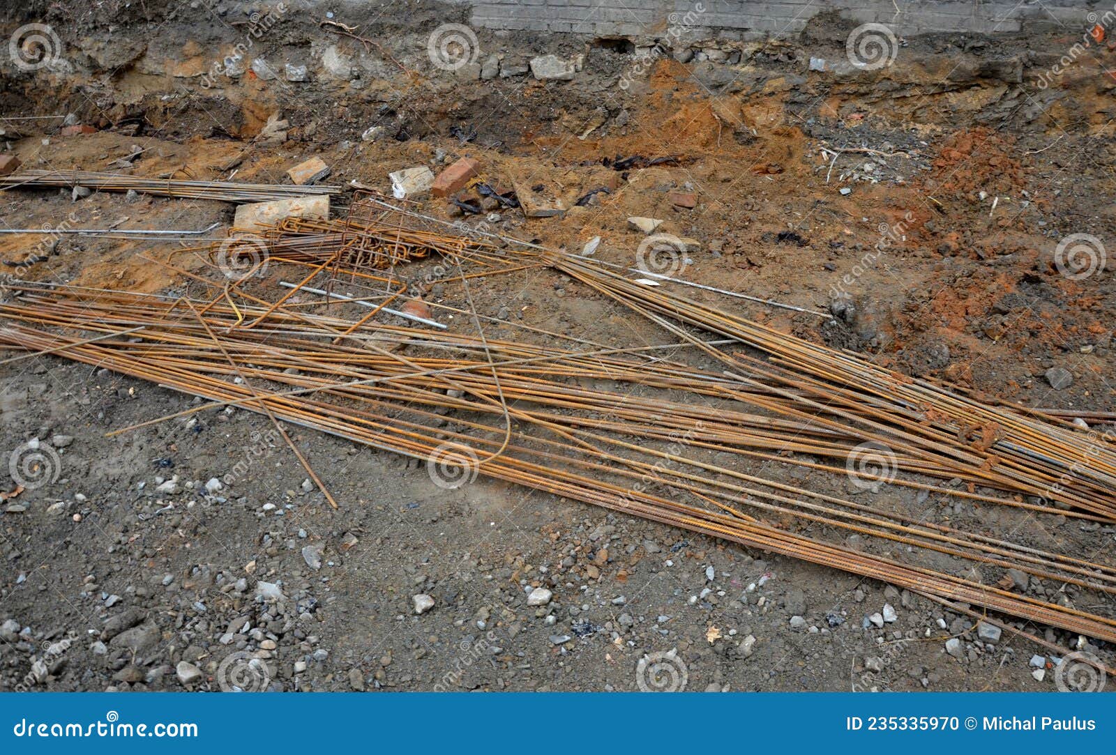 Rusty Wires Lying in a Mess on the Ground Construction Site. Concrete ...