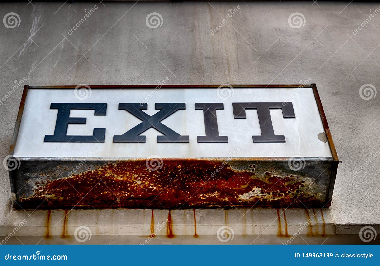 Rusty Worn Exit Sign on a Concrete Wall Stock Image - Image of urban ...