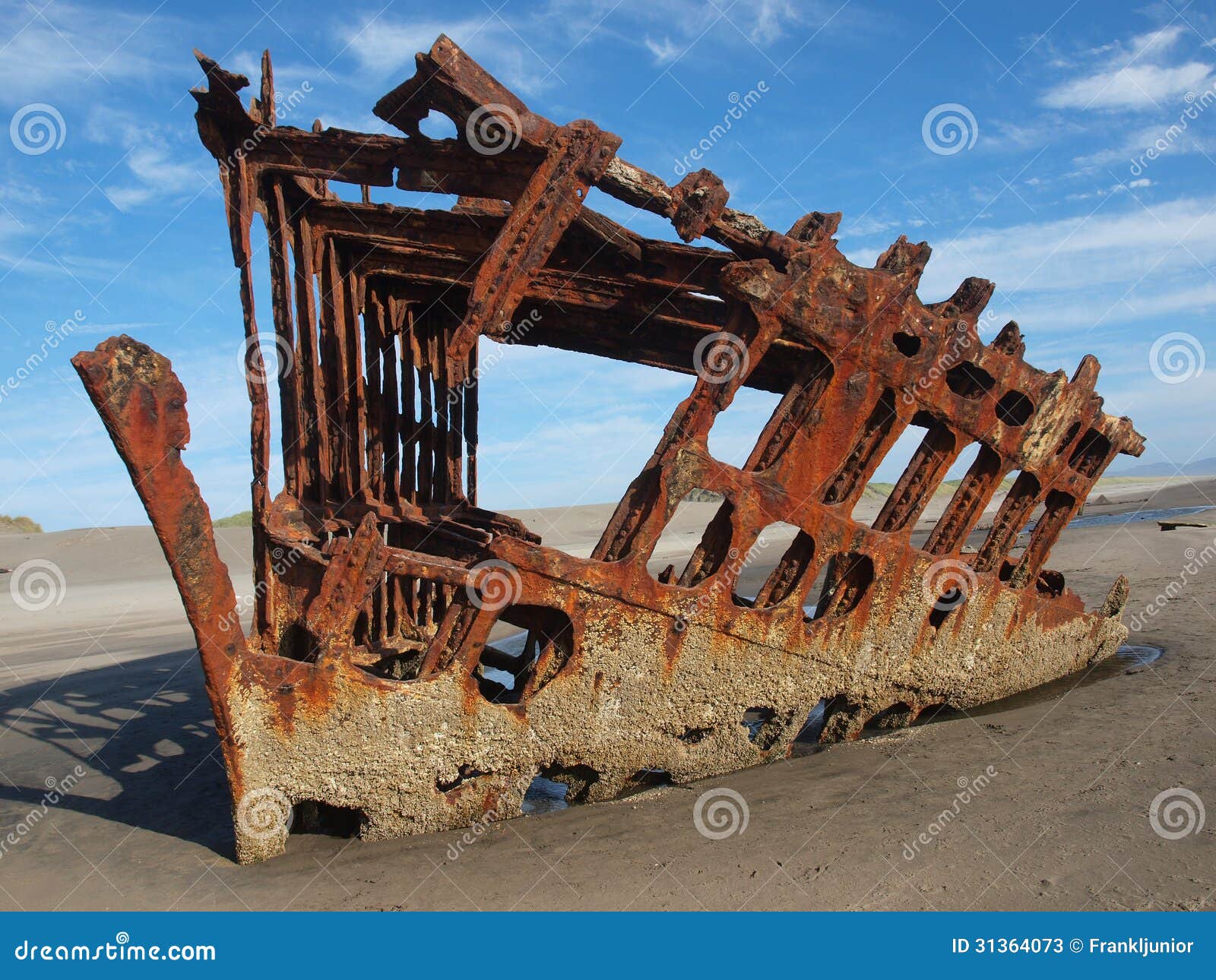 Rusty Wreckage of a Ship stock image. Image of coastline - 31364073