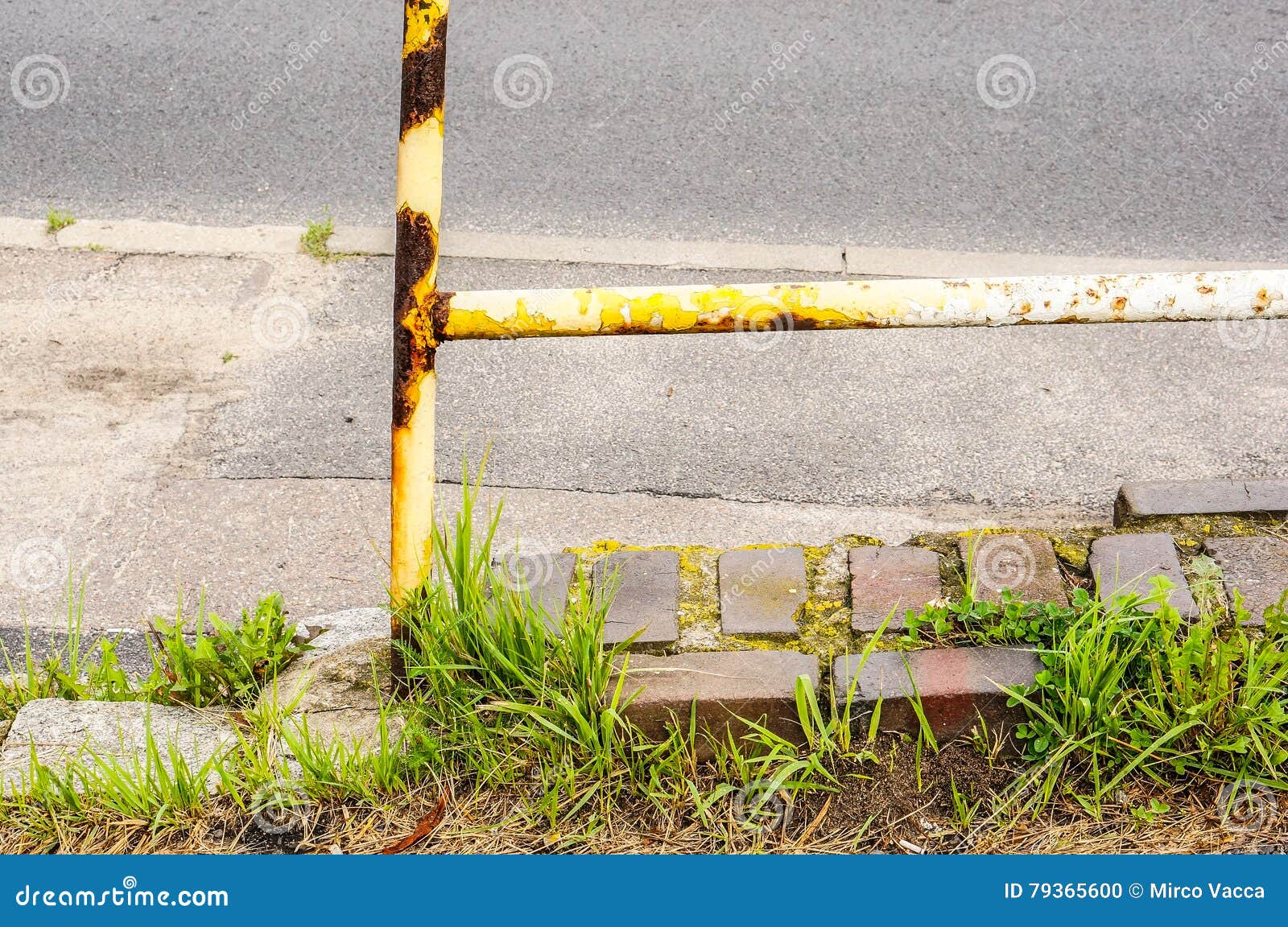 Rusty yellow barrier stock photo. Image of street, rusty - 79365600