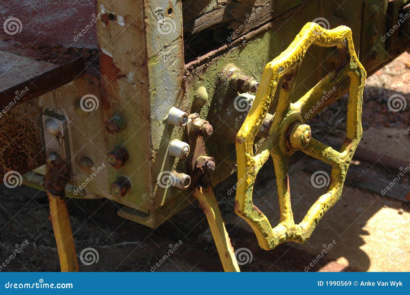 Rusty Yellow Wheel on Valve Stock Image - Image of control, wheel: 1990569