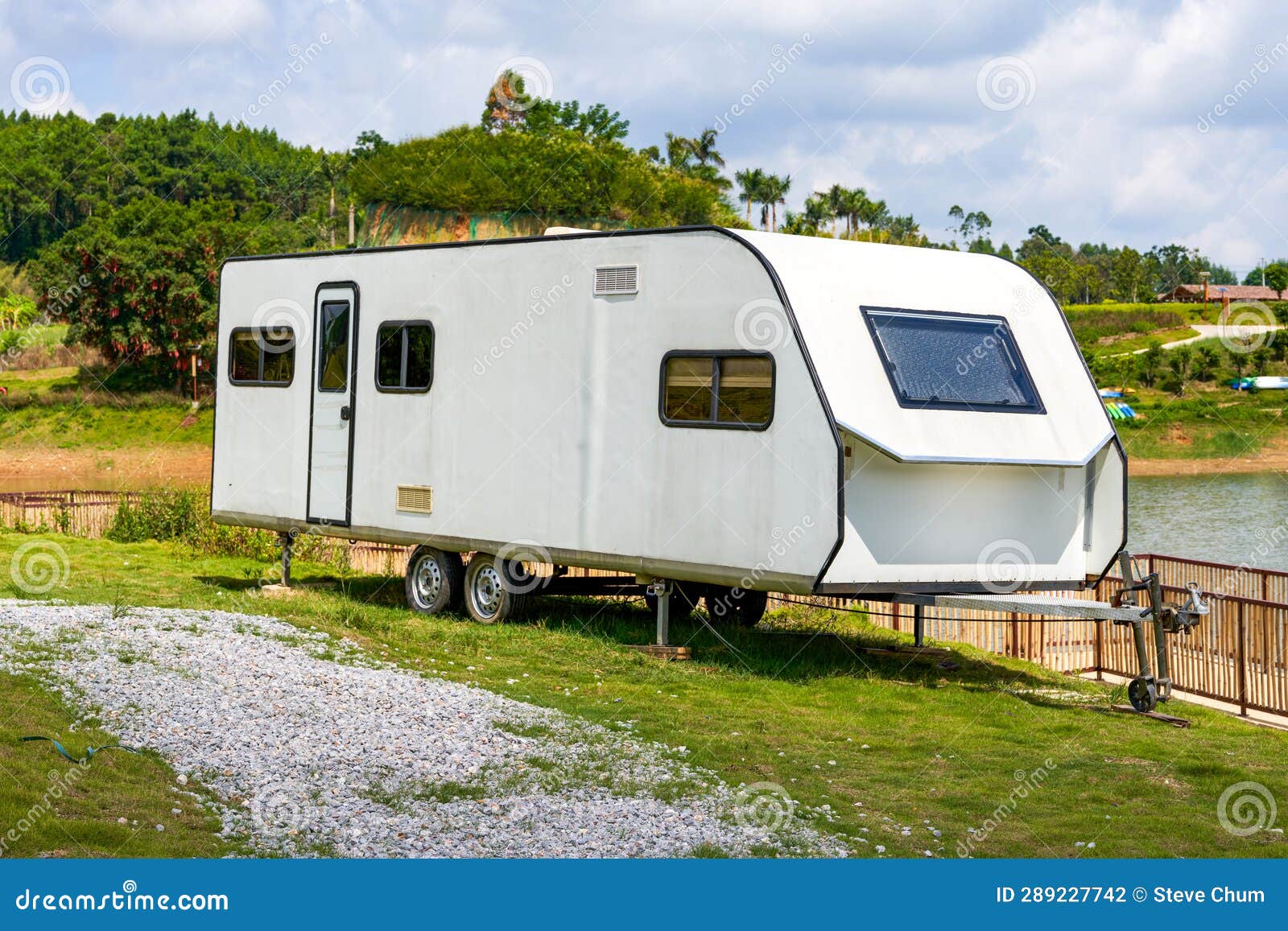 An RV Parked on the Lawn Outdoors Stock Photo - Image of cottage ...
