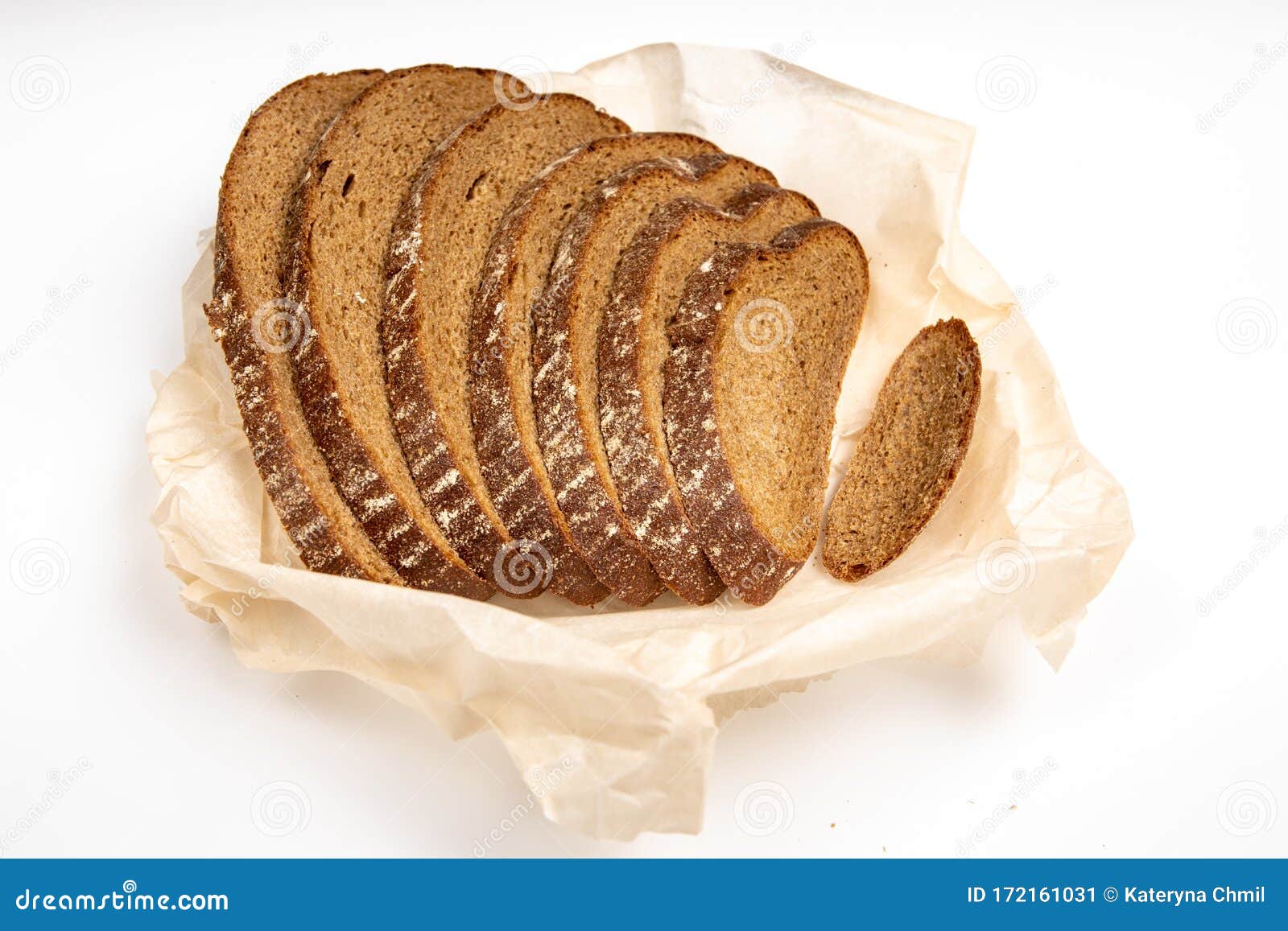 Rye Bread Cut in Pieces Lying on the Baking Paper on a White Background ...