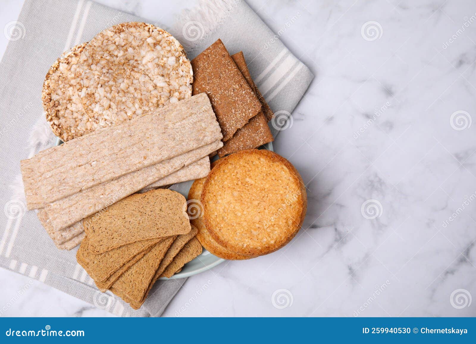 Rye Crispbreads, Rice Cakes and Rusks on White Marble Table, Flat Lay ...
