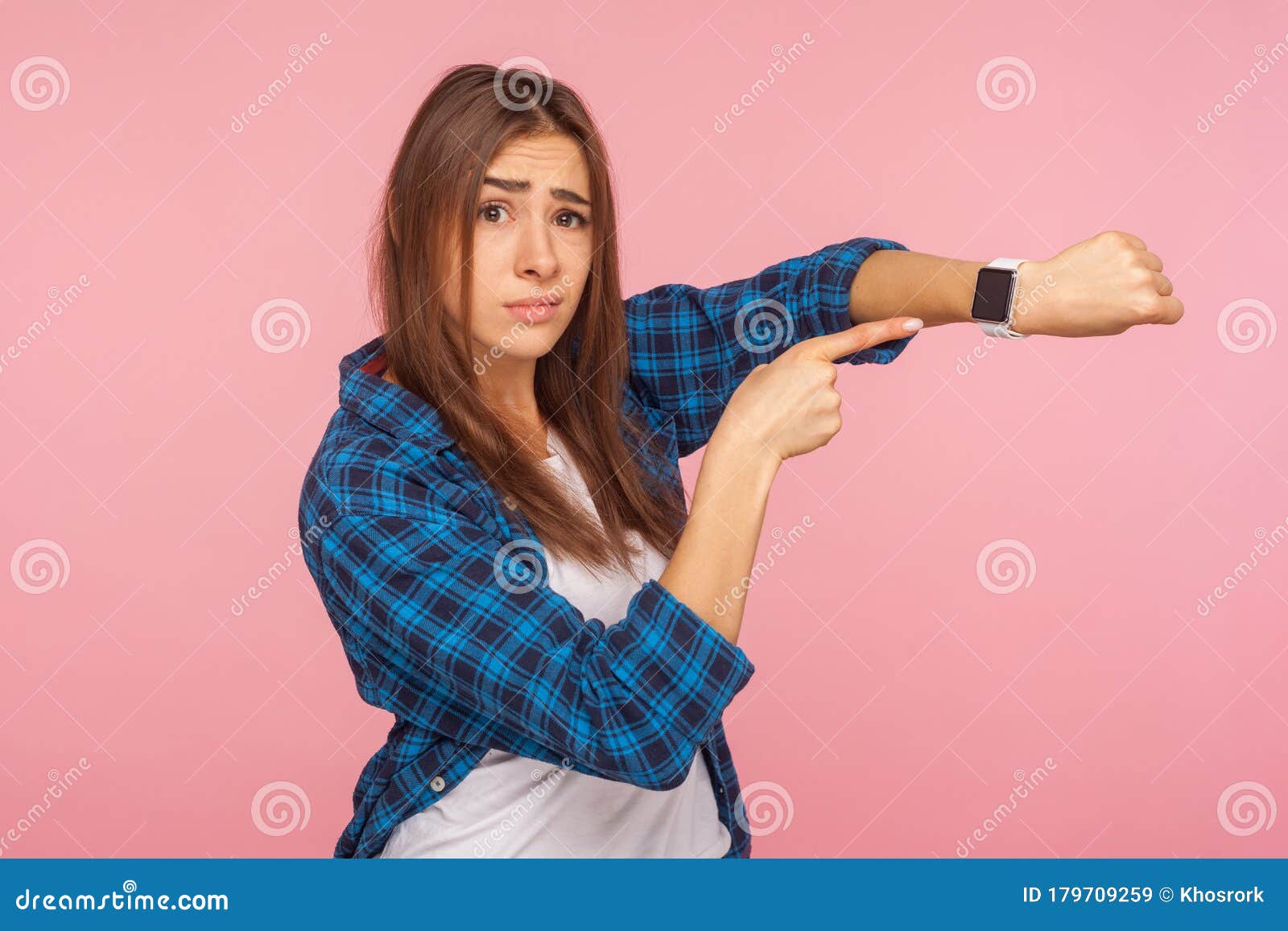 It`s Late! Portrait of Impatient Young Woman in Checkered Shirt ... It`s Late! Portrait of Impatient Young Woman in Checkered Shirt ...