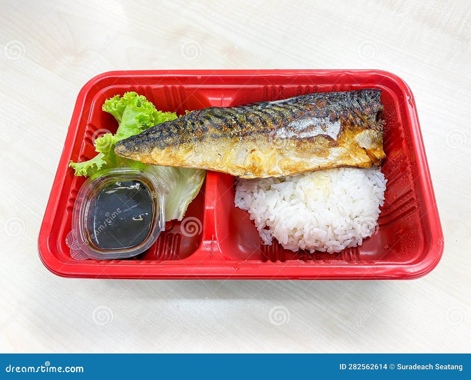 Saba Fish Grilled with Salad in the Food Container Stock Photo - Image ...