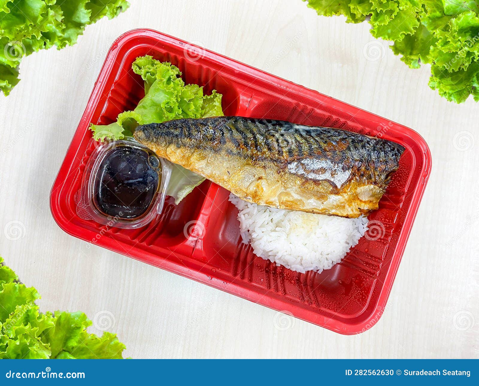 Saba Fish Grilled with Salad in the Food Container Stock Photo - Image ...