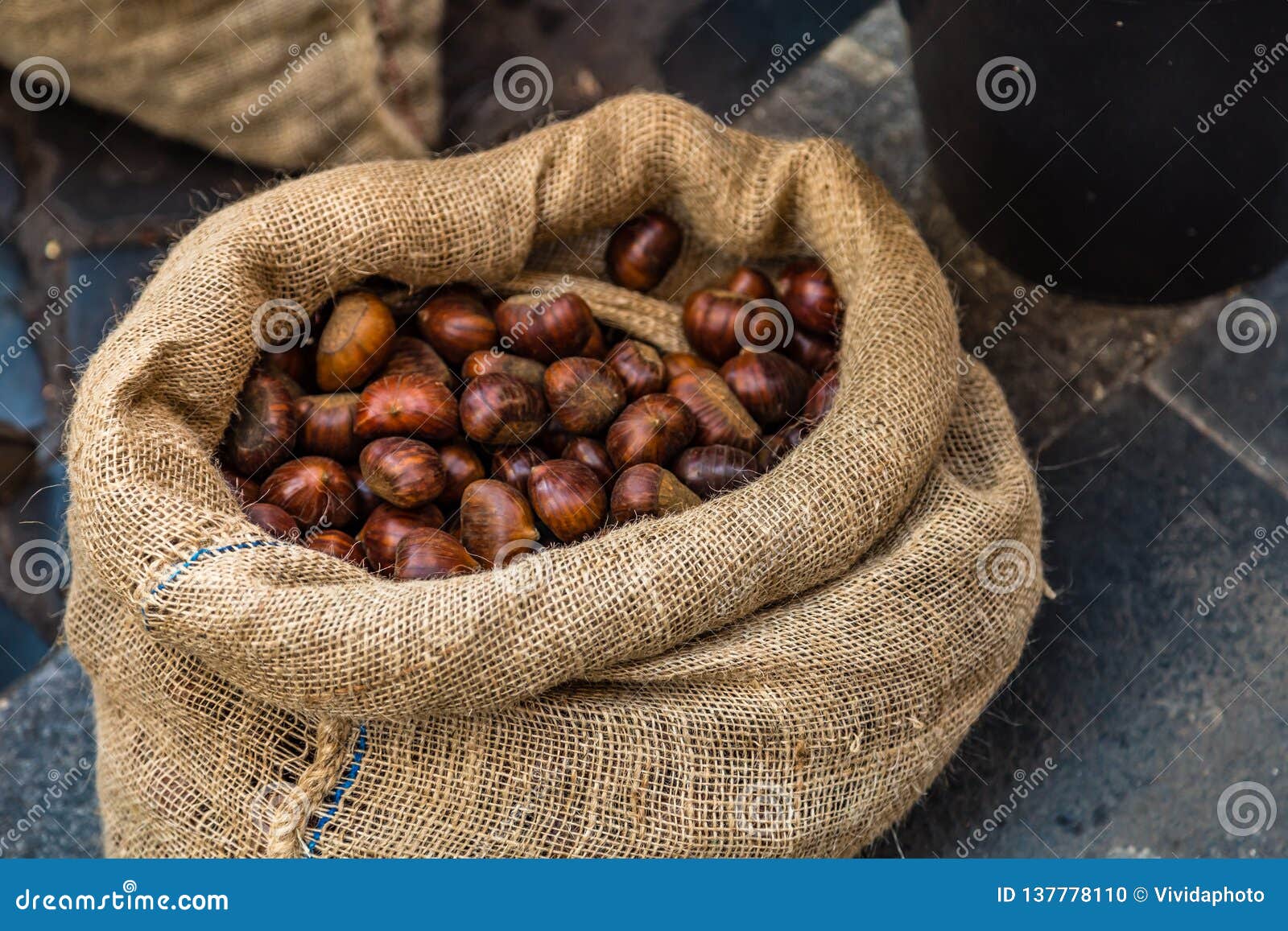 Sack of chestnuts stock photo. Image of food, winter - 137778110