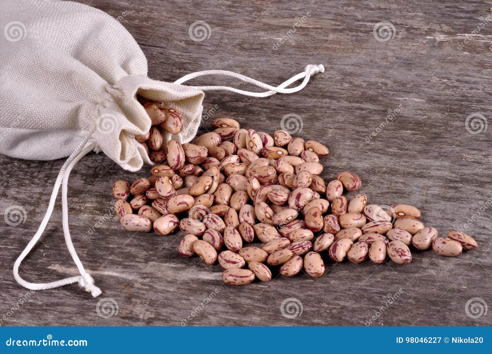 Sack of Mix Beans Spill Beans with Beans on Wooden Table Stock Image ...