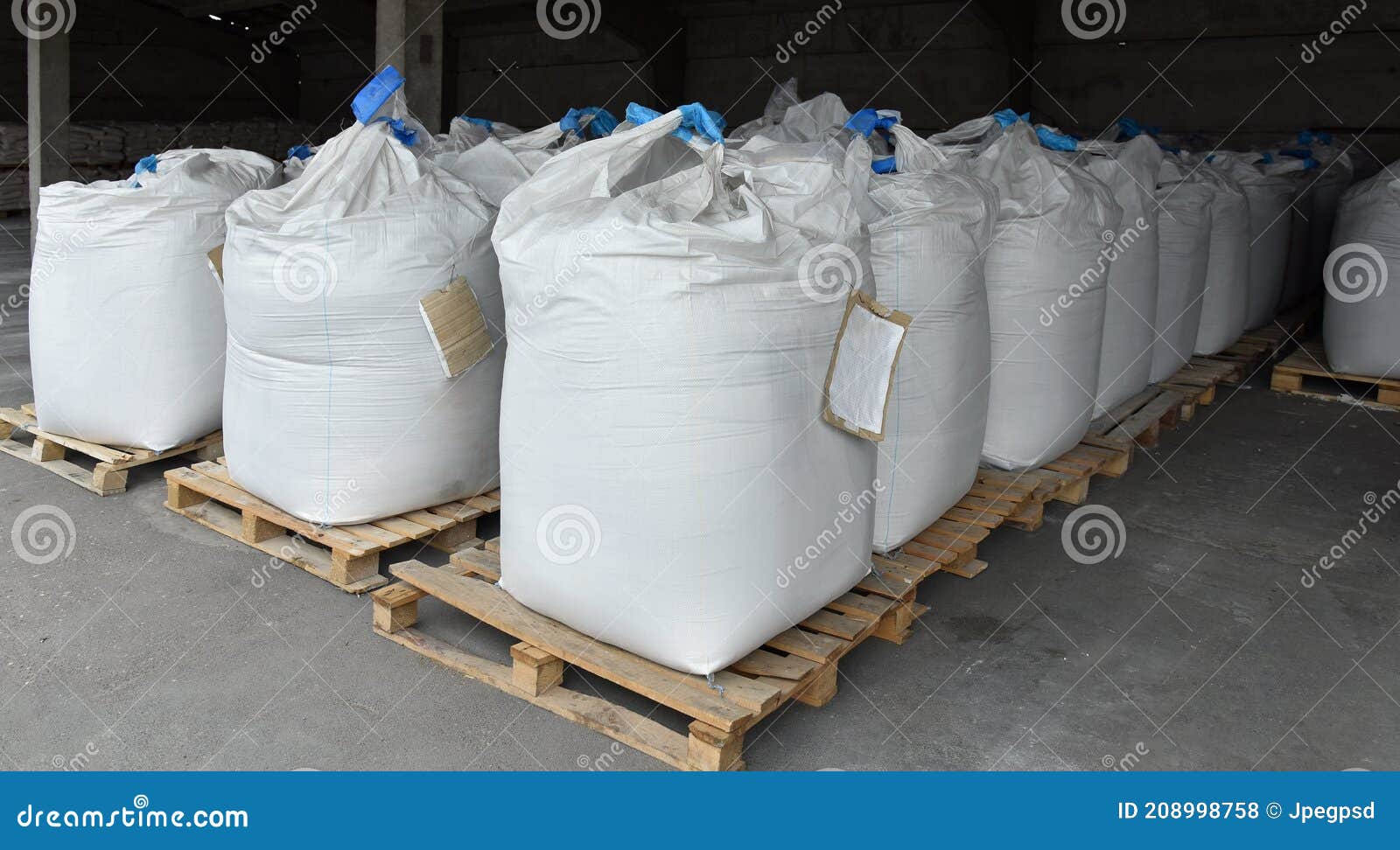 Sacks of Flour and Grain are Stacked in Neat Rows in the Warehouse of ...