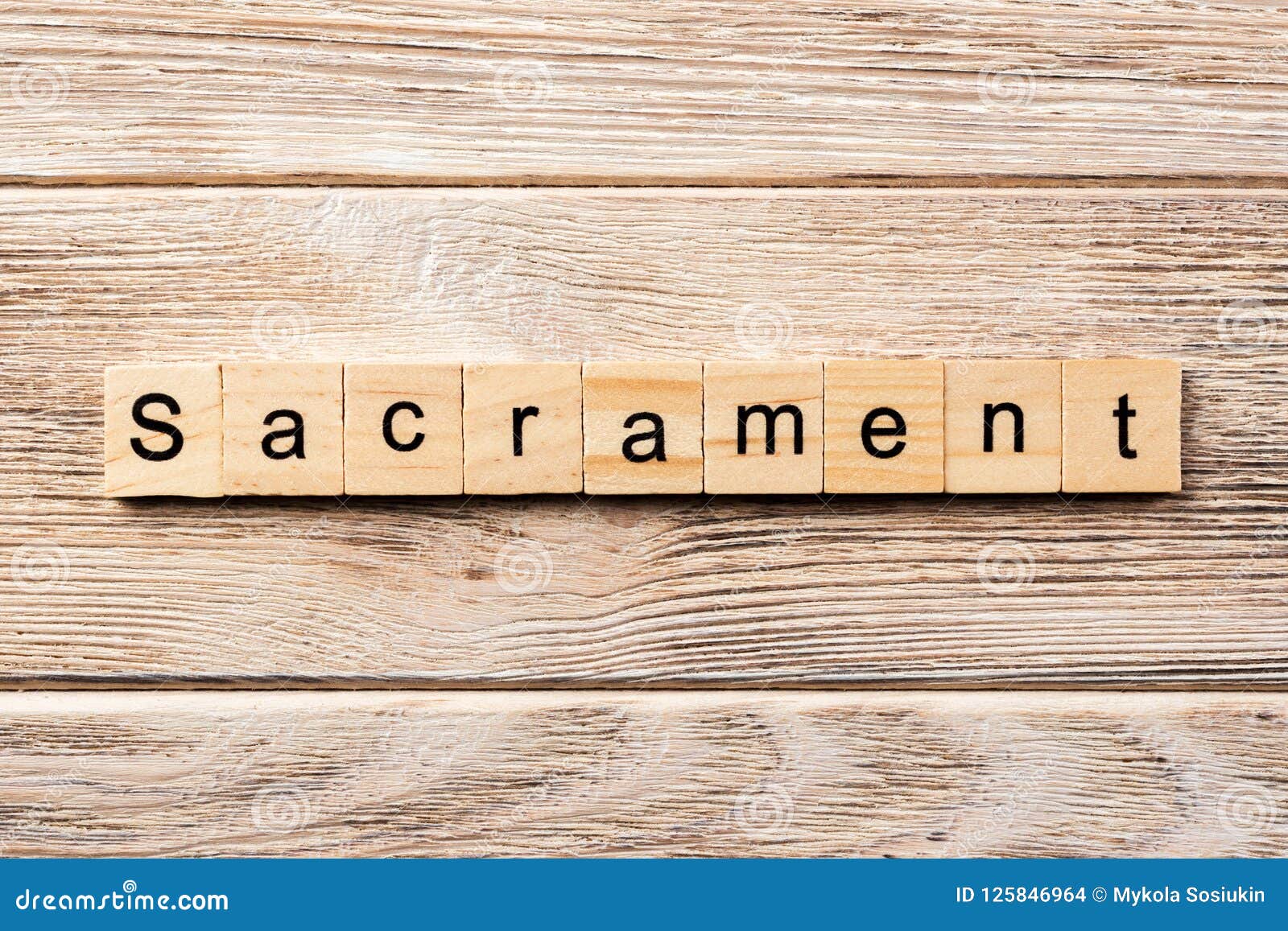 Sacrament Word Written on Wood Block. Sacrament Text on Table, Concept ...