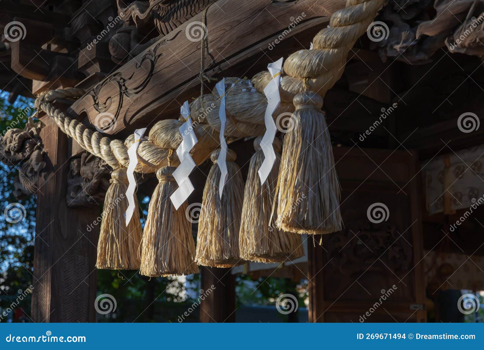 A Sacred Rope in Front of the Temple at Japanese Shrine Stock Photo ...