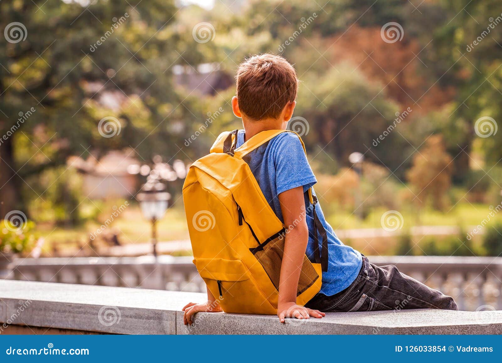 Sad Alone Boy Sitting in the Park Outdoors Stock Photo - Image of ...