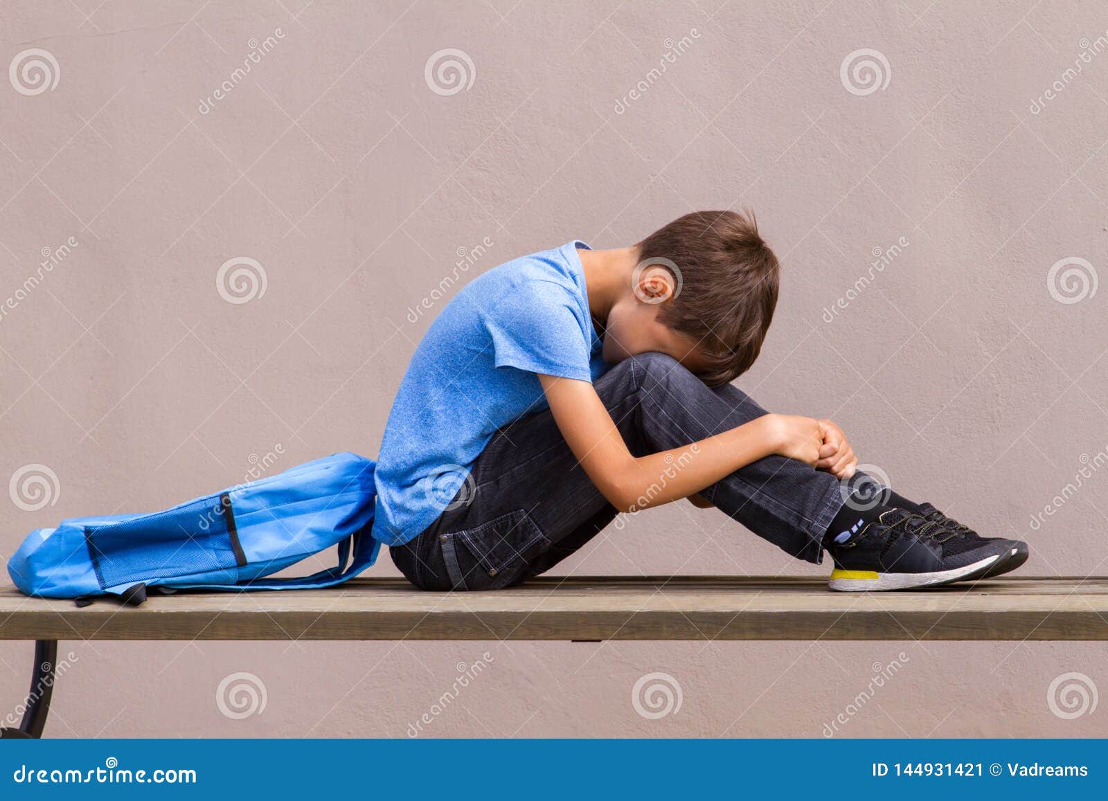 Sad Alone Child Sitting on the Bench Outdoors Stock Image - Image of ...