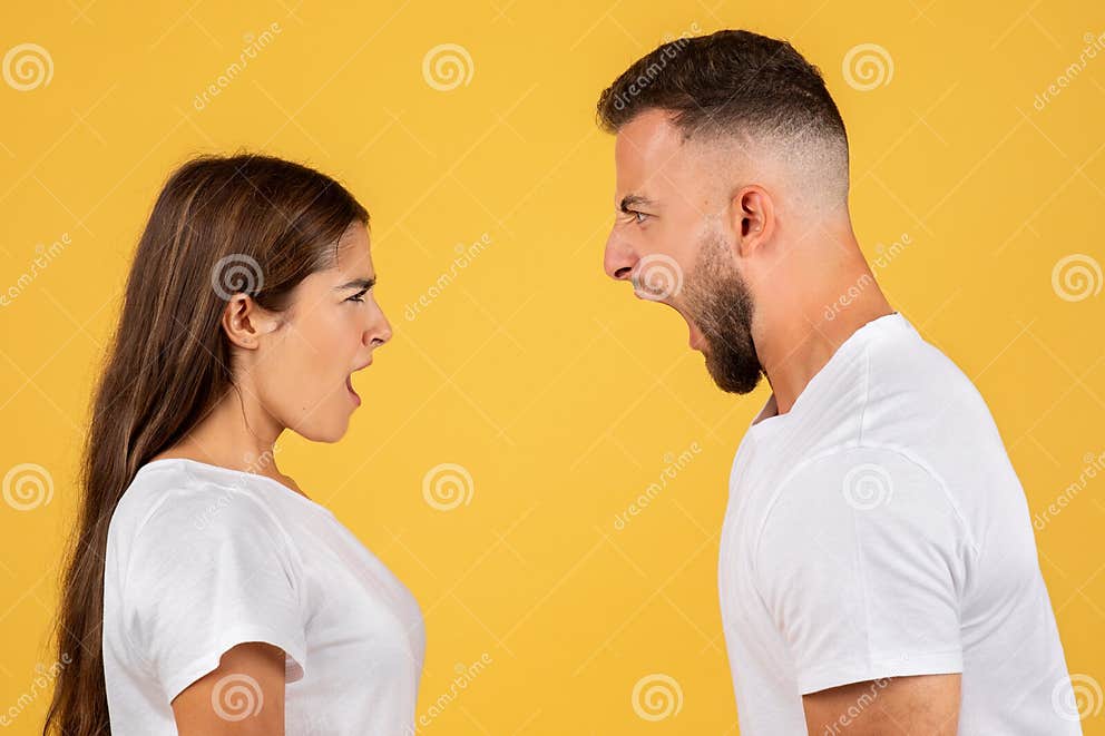 Sad Angry Millennial European Couple In White T Shirt Scream Quarrel